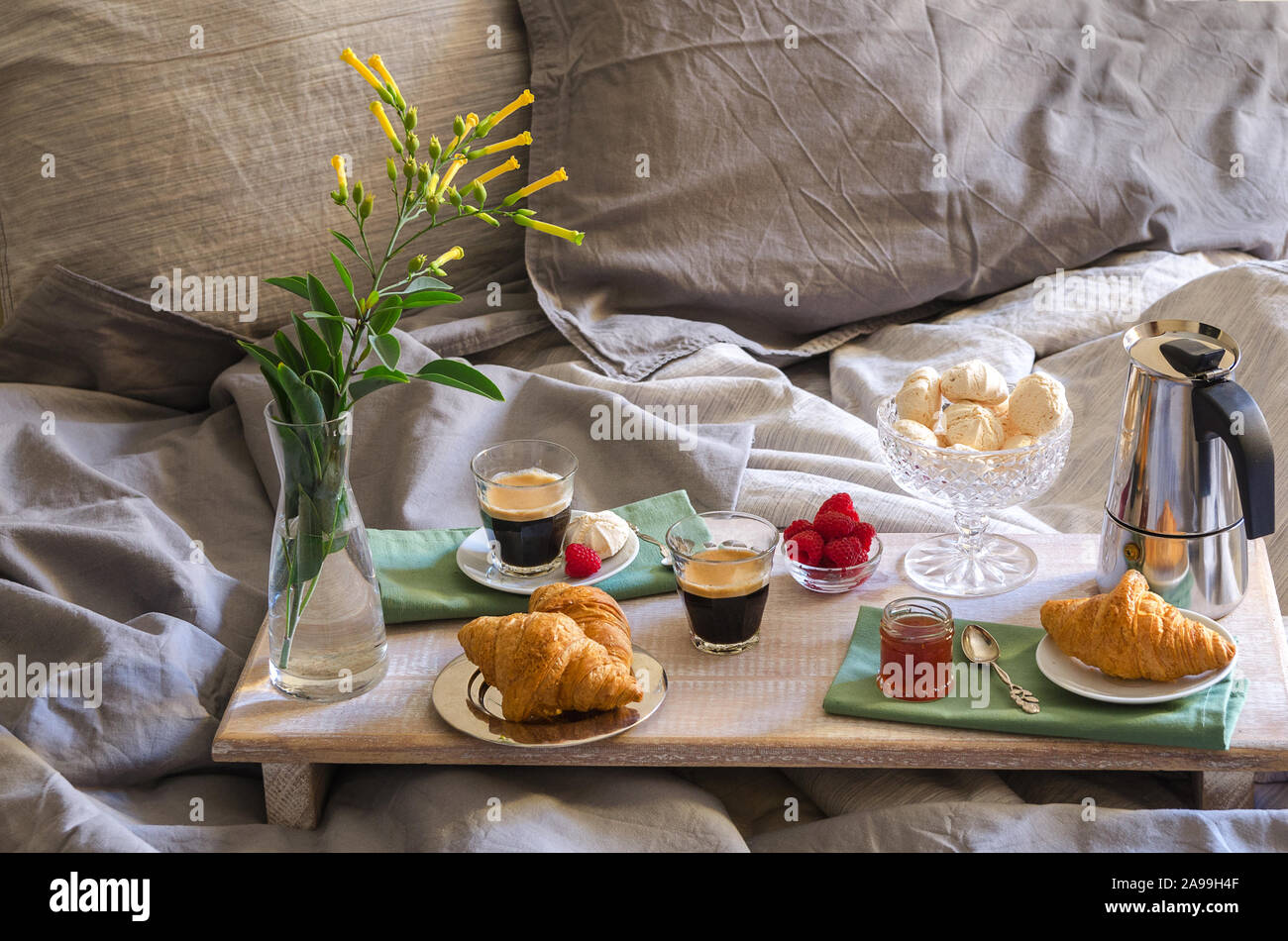 Romantic Breakfast for two inside a bedroom. Coffee maker and coffee ...