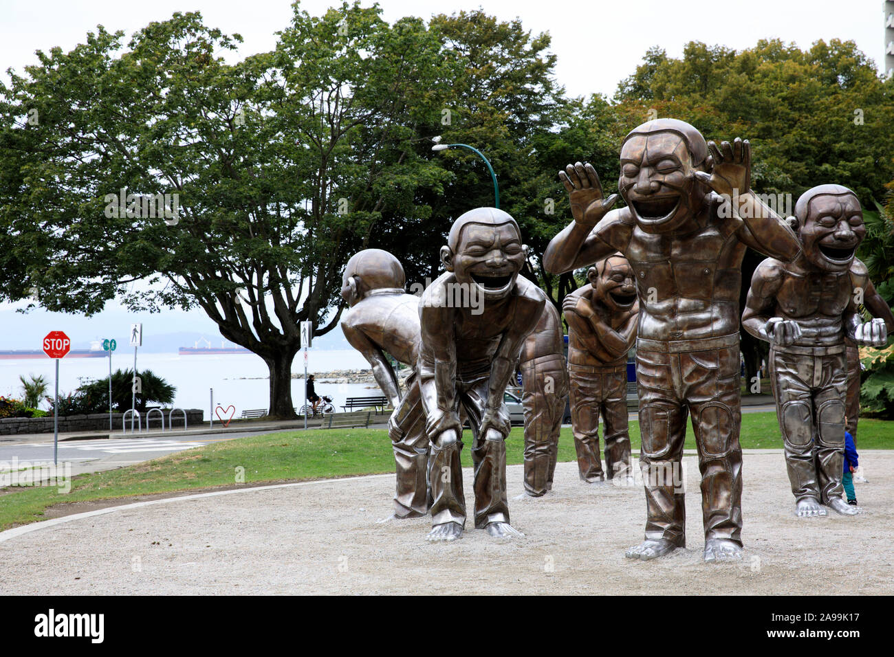 Giant Laughing Statues to stay in English Bay, Vancouver, America Stock ...