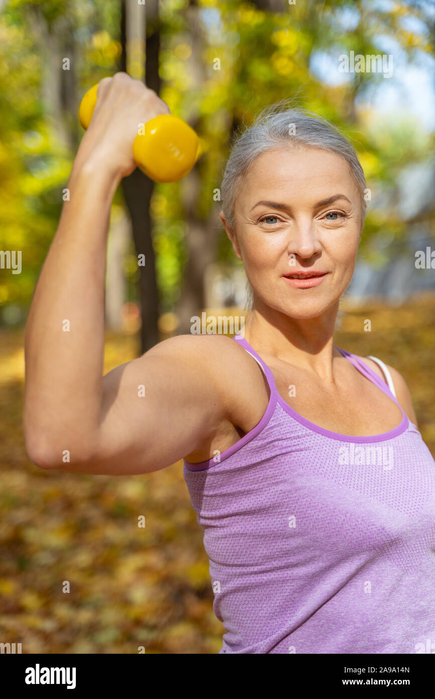 Strong pretty lady looking at the camera Stock Photo - Alamy