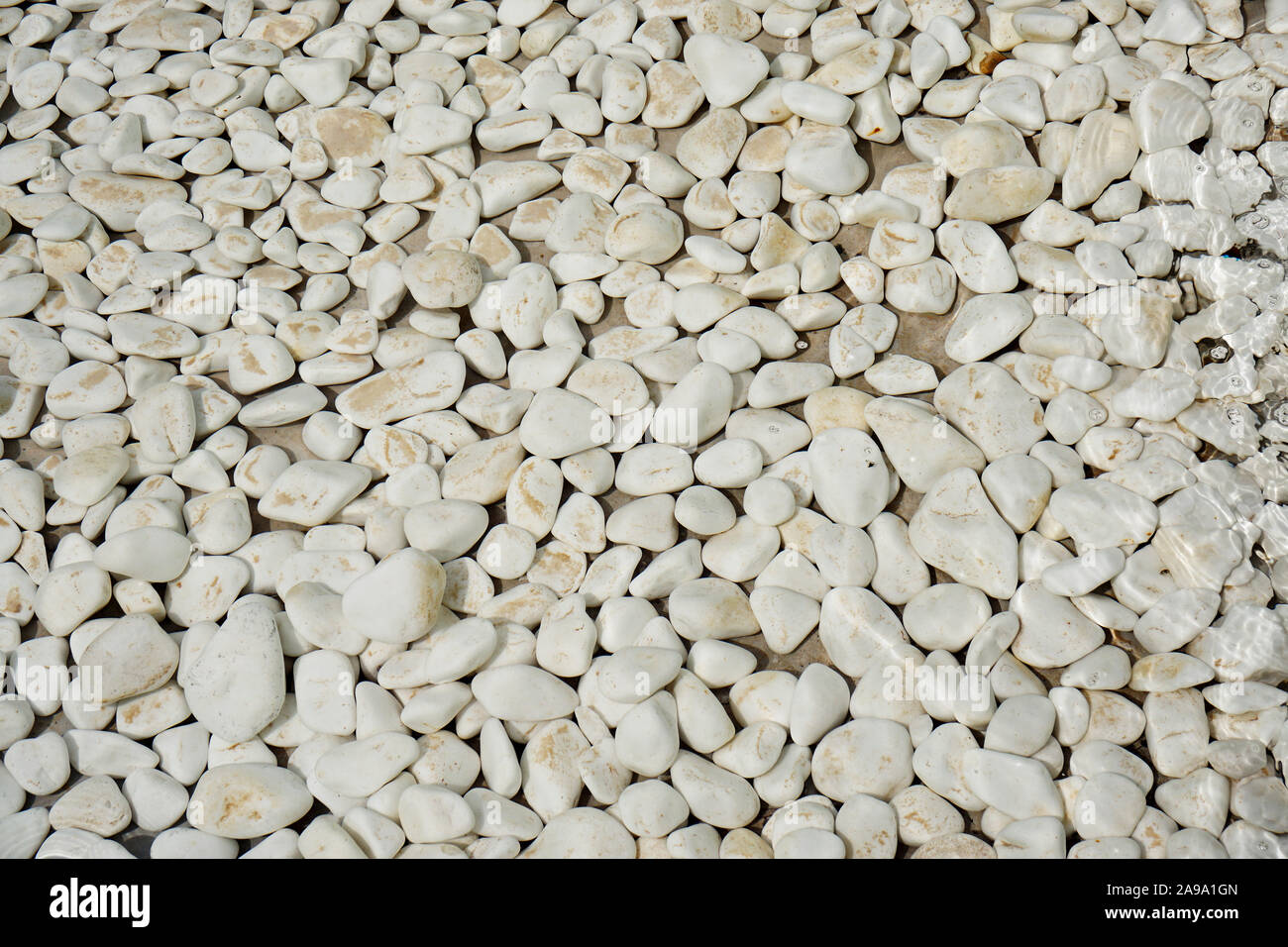Image of white small stones on transparent water texture background ...