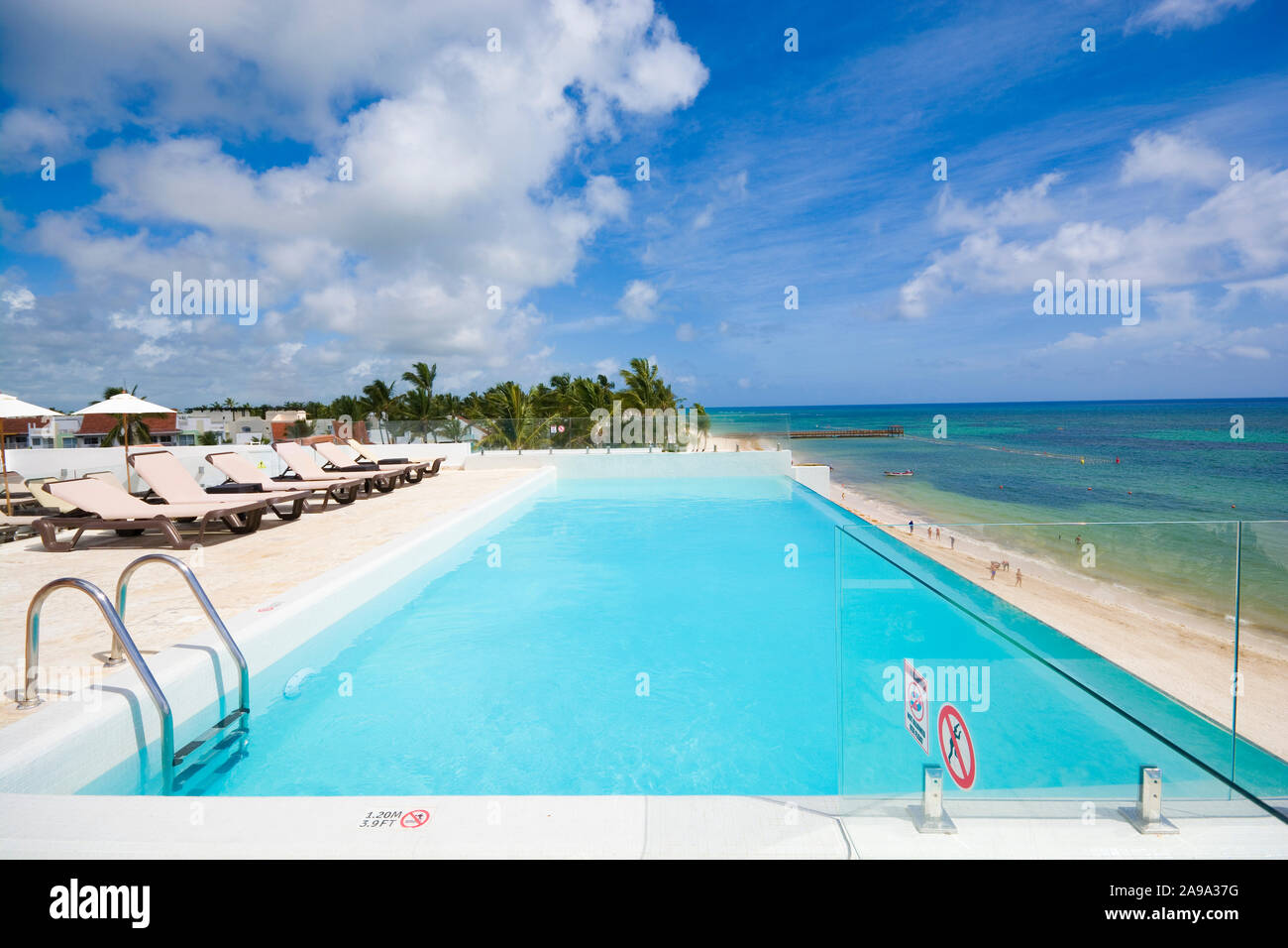 Empty infinity swimming pool on the roof of luxury hotel on the coast ...