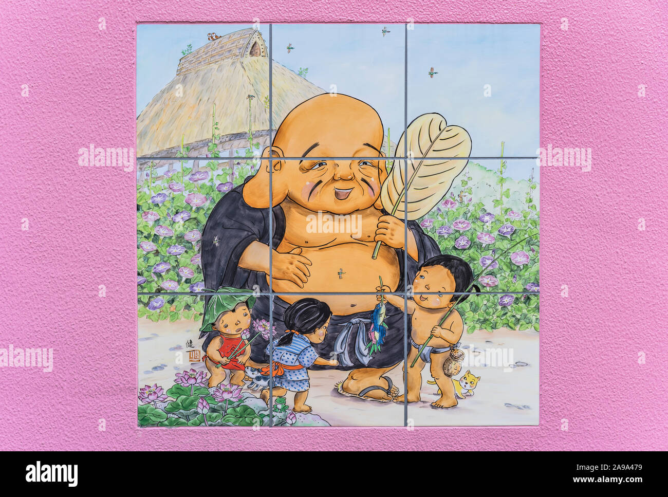 Pink wall of Tokyo Shushoin temple decorated with cute illustrations on ...