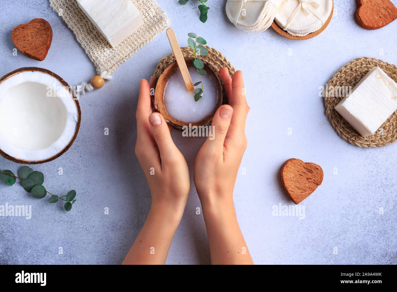 Natural cosmetic products setting with soaps and fresh herbs top view ...