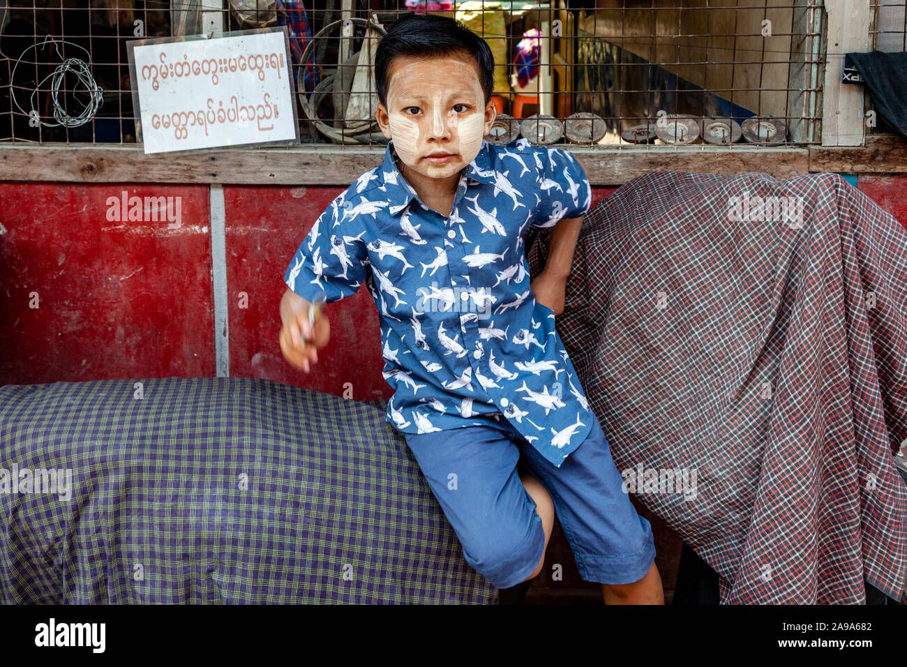 A Portrait Of A Young Burmese Boy At The Jade Market, Mandalay, Myanmar ...