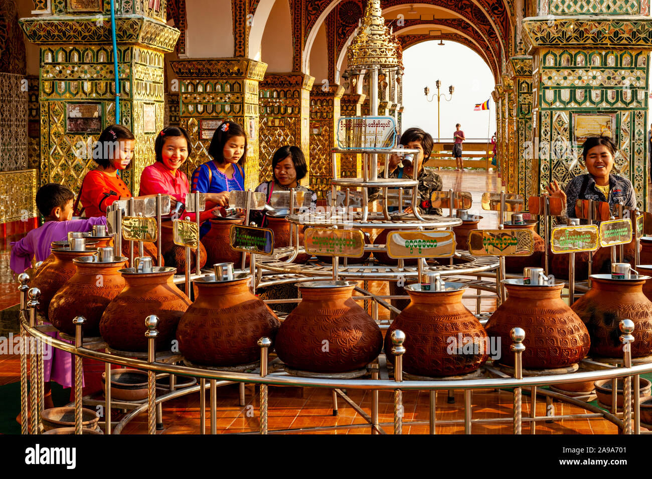 Buddhists Drinking Water From Clay Pots, Su Taung Pyae Pagoda, Mandalay ...
