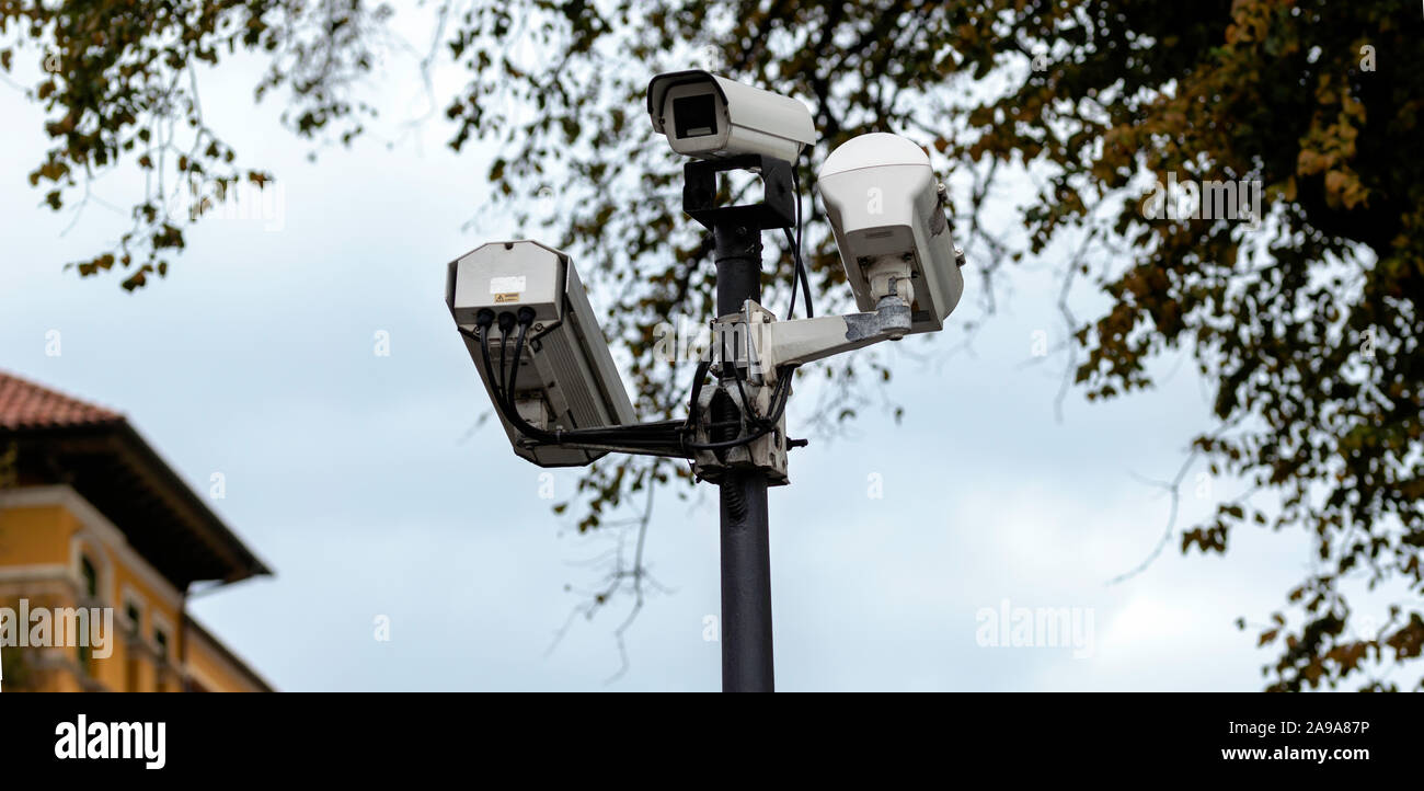 Security CCTV Cameras on a lamp post in the park Stock Photo - Alamy
