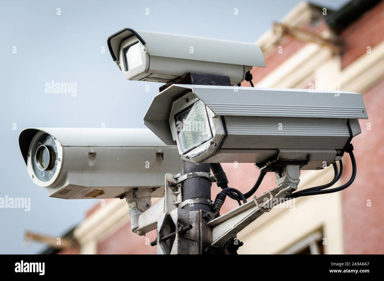 Close Up of a Security CCTV Cameras on a lamp post Stock Photo - Alamy
