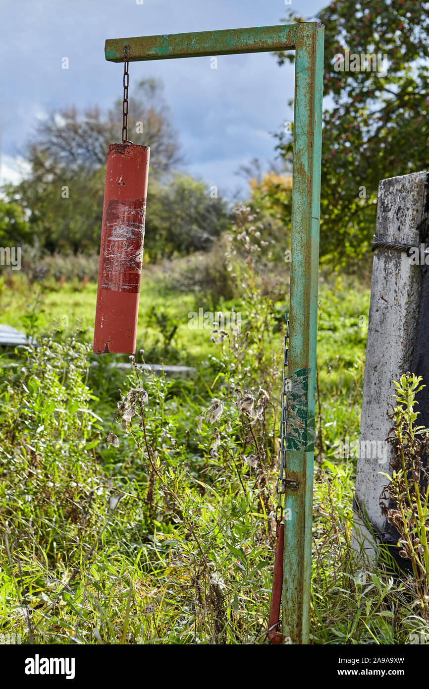 Fire bell installed in a public place, on a rural street, designed to ...