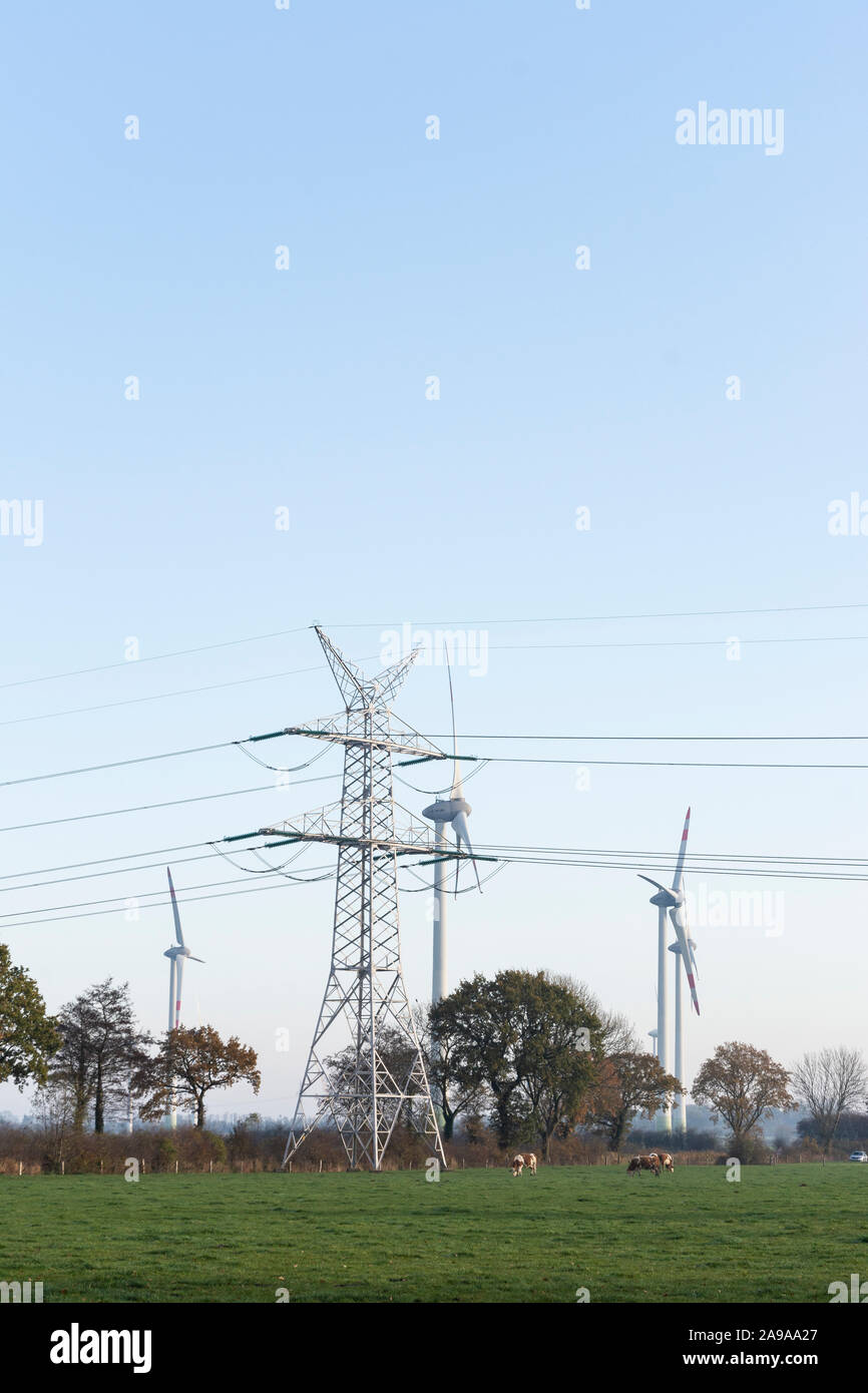 Pylons and wind turbine Stock Photo - Alamy