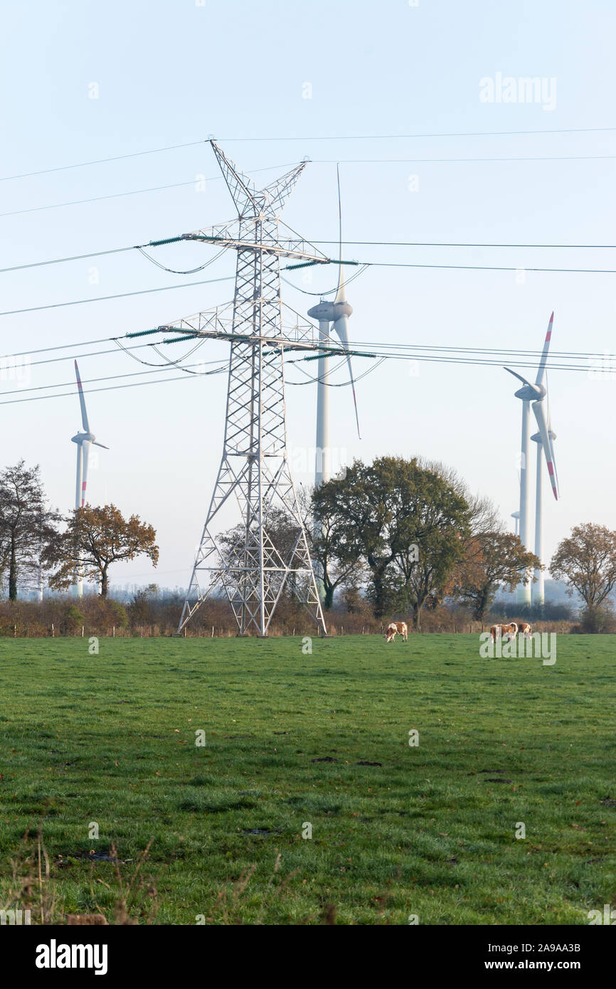 Pylons and wind turbine Stock Photo - Alamy