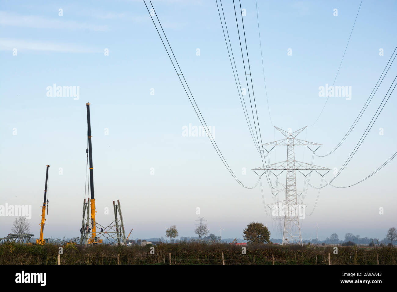 Powerline crane hi-res stock photography and images - Alamy