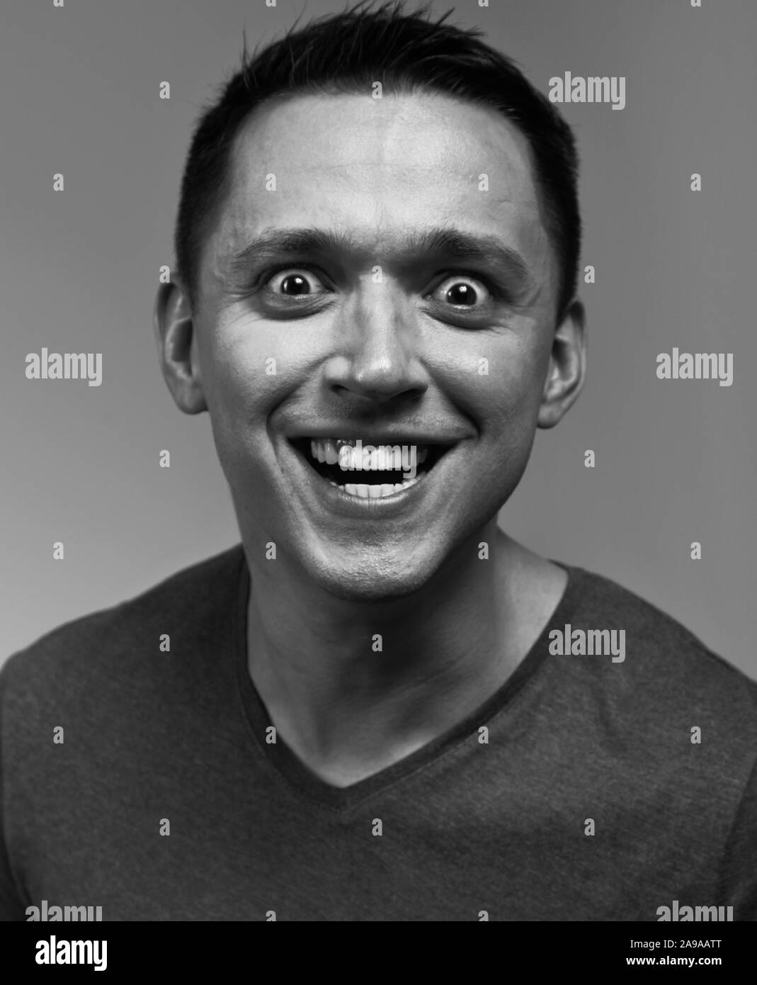 Angry mad crazy man shouting the wide opened eyes and anger smile ...