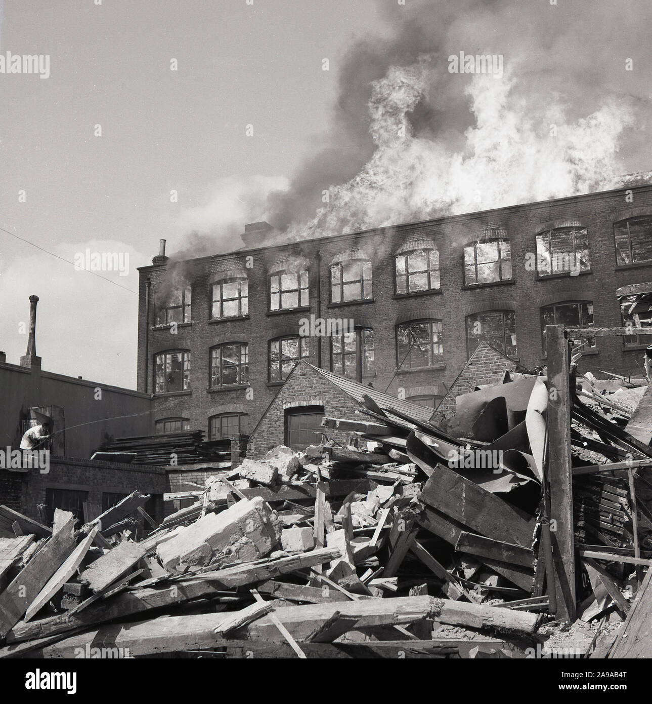 1950s, historical, burning building, London, England, UK Stock Photo ...