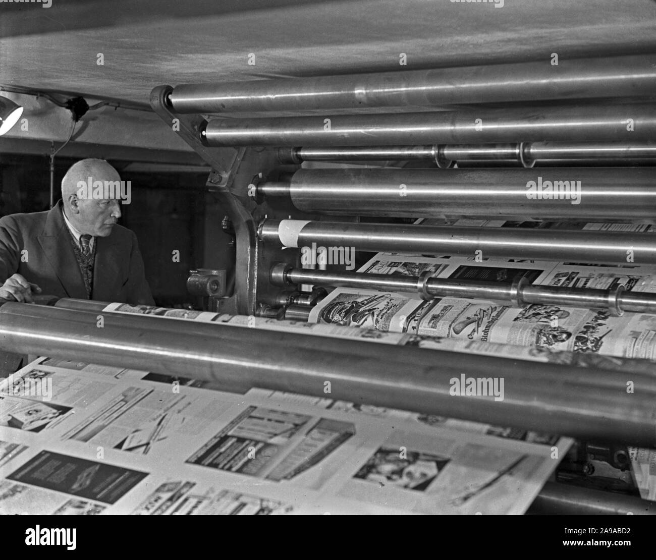 A working day at a printing office, Germany 1930s Stock Photo - Alamy