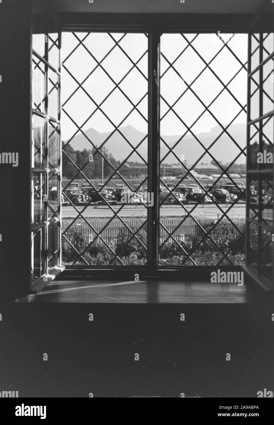 View out of a window on a parking space in front o the panoramic view ...