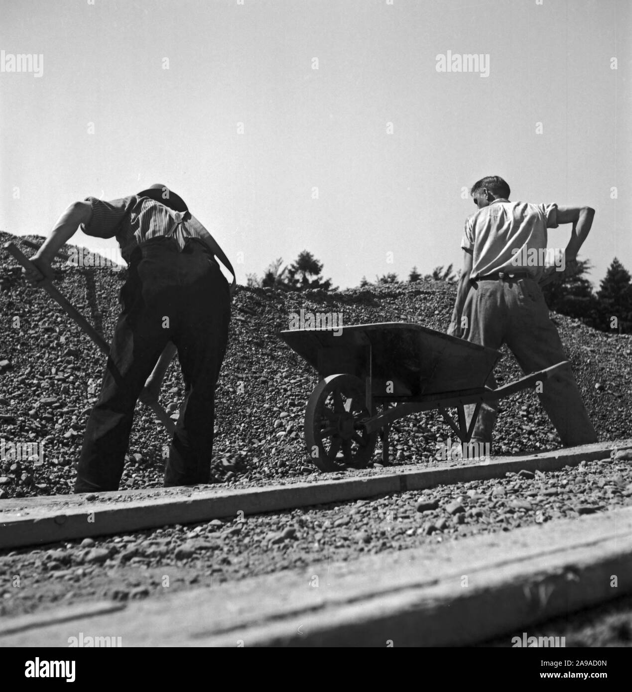 Construction workers working on a bridge, Germany 1930s Stock Photo - Alamy