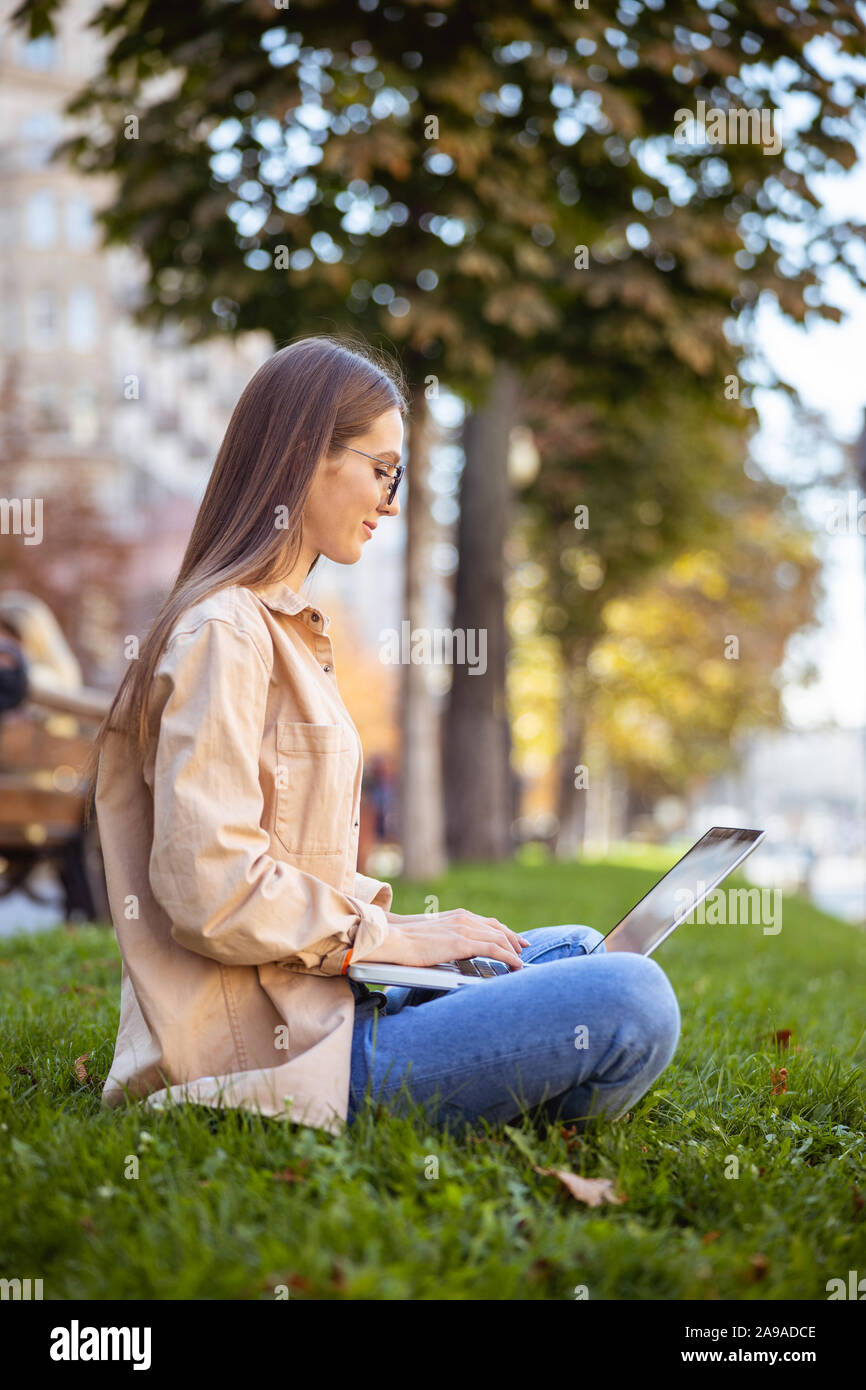 Pretty woman being concentrated on her work Stock Photo - Alamy