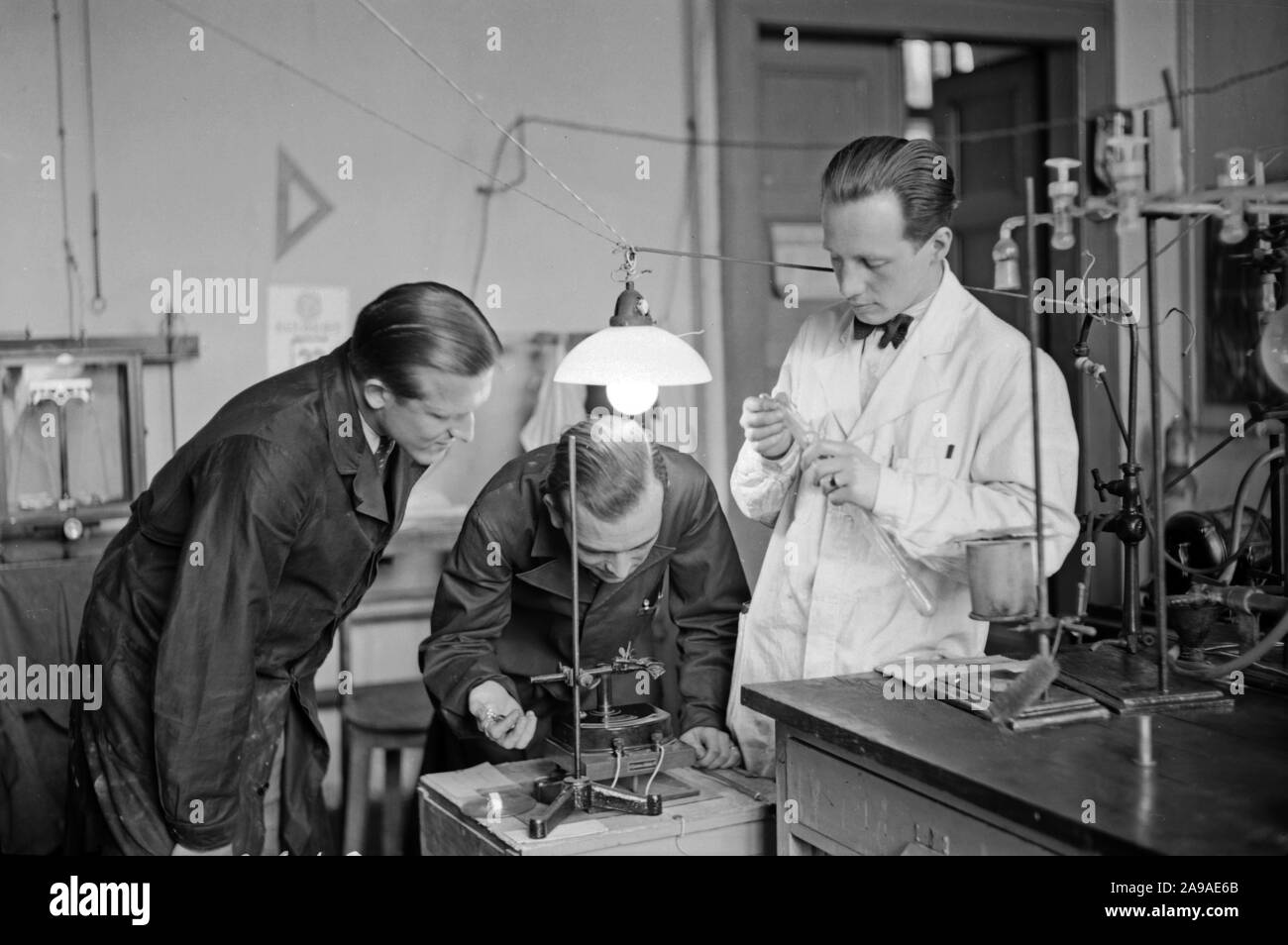 Original caption: PhD students in the inorganic laboratory of the ...