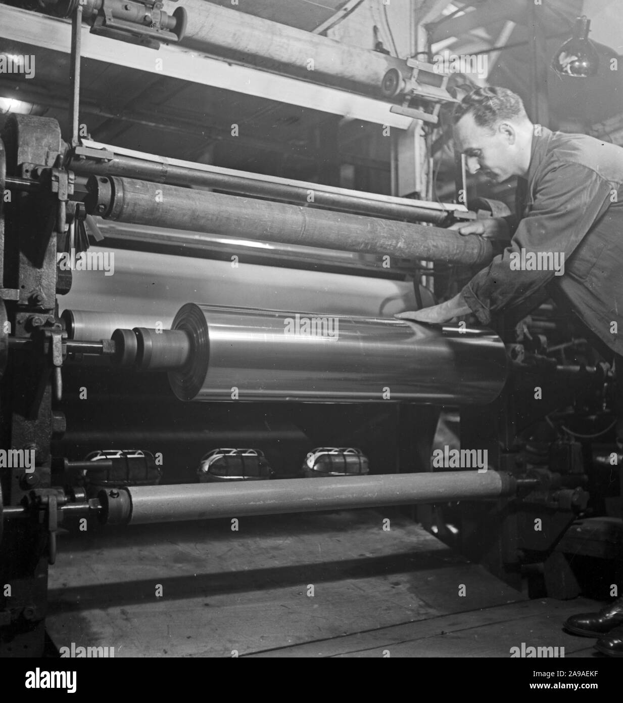 Workers at a factory producing cellophane, Germany 1930s Stock Photo ...