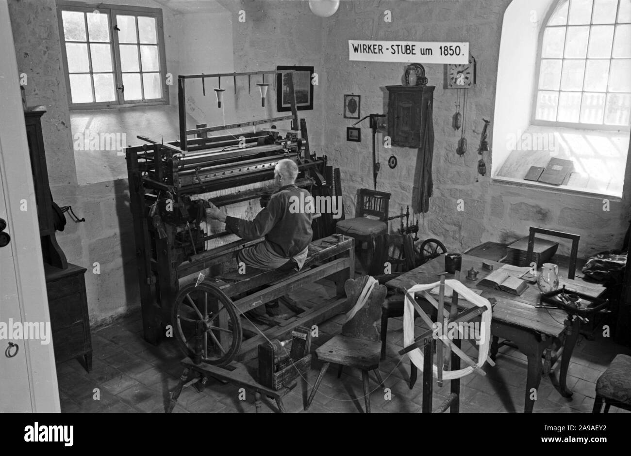 Worker at a weaving and spinning factory, Germany 1930s Stock Photo - Alamy
