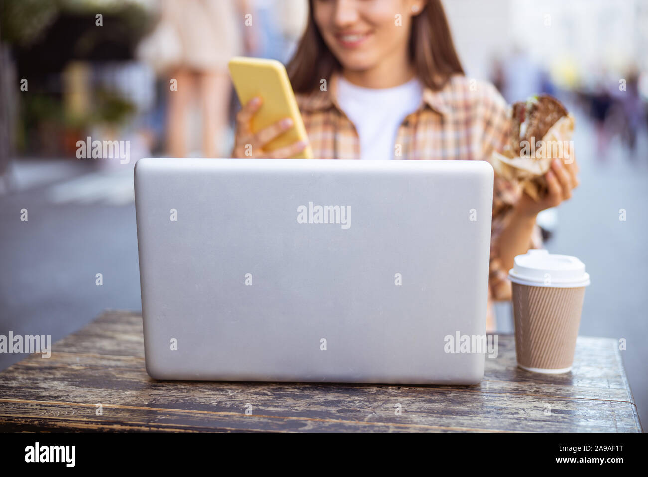Woman making a small break during her work Stock Photo - Alamy