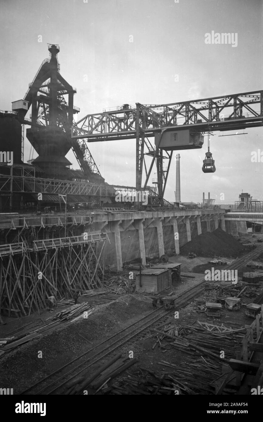 Visiting a blast furnace works, Germany 1930s Stock Photo - Alamy