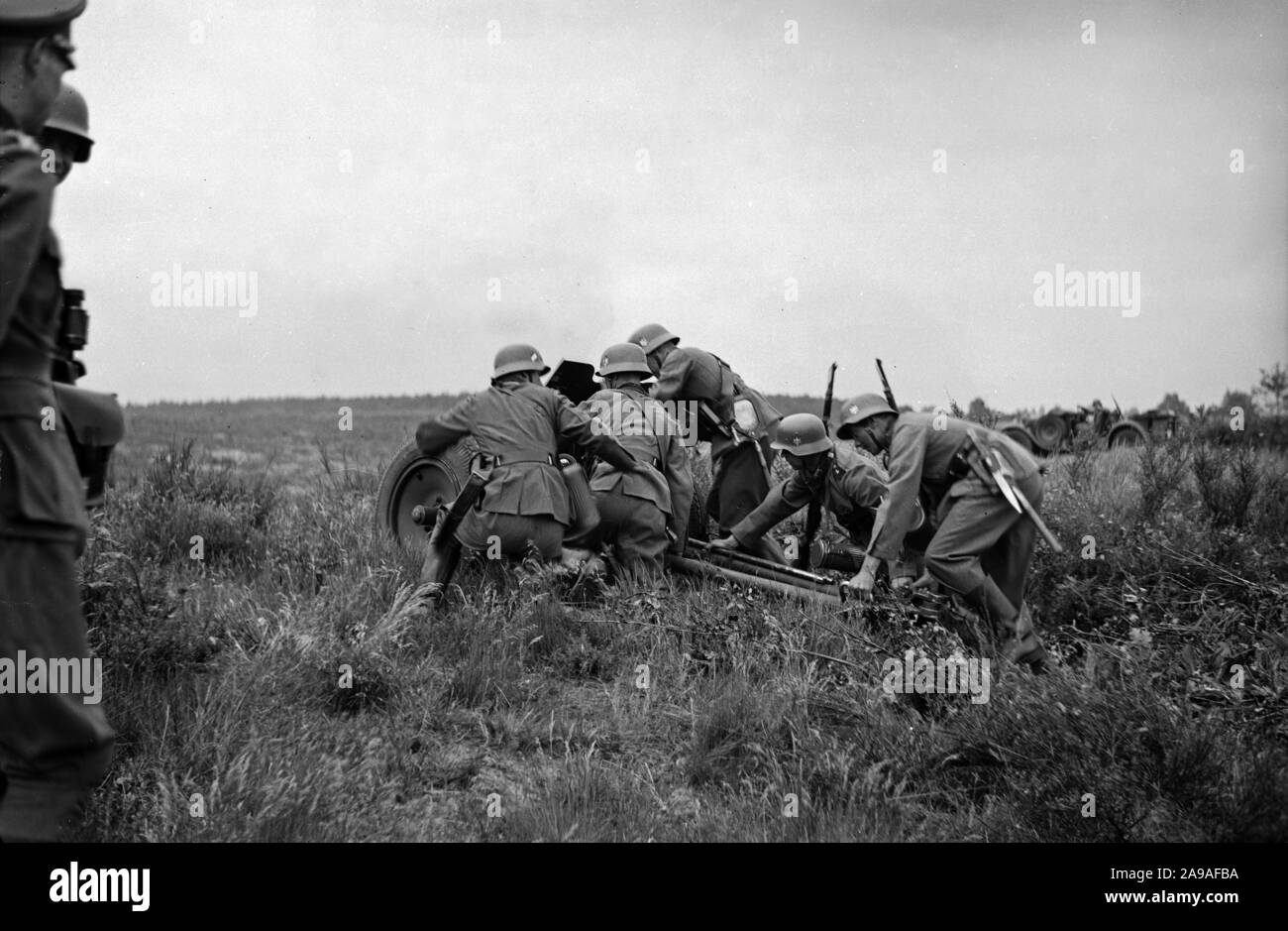 Soldiers of the German Wehrmacht practising and exercising on a ...