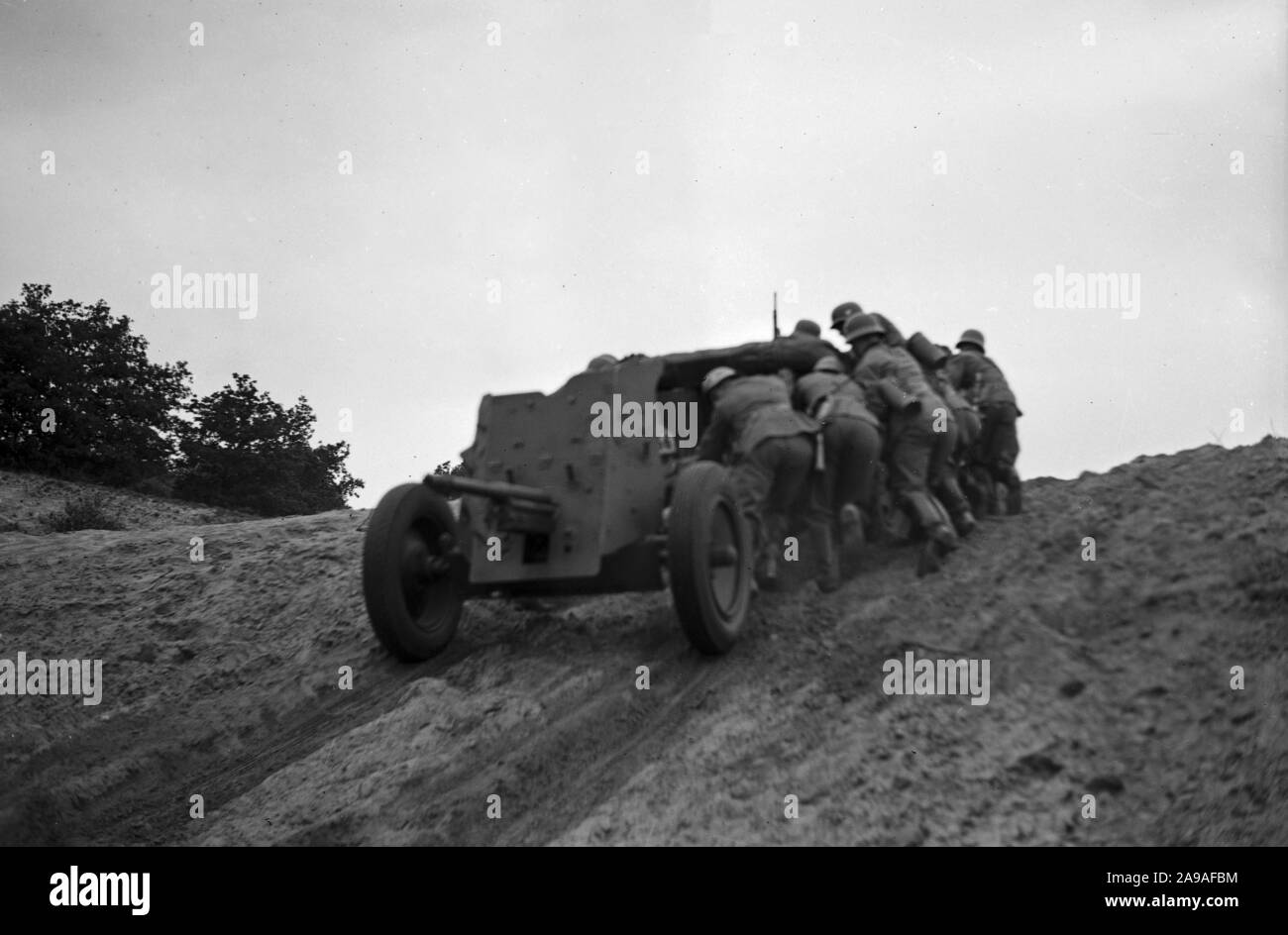 Soldiers of the German Wehrmacht practising and exercising on a ...