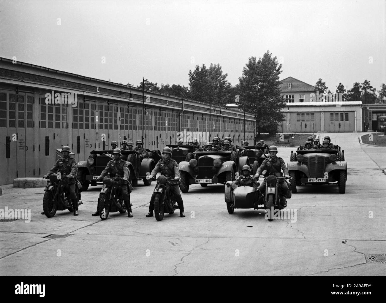 Soldiers of the German Wehrmacht practising and exercising on a ...