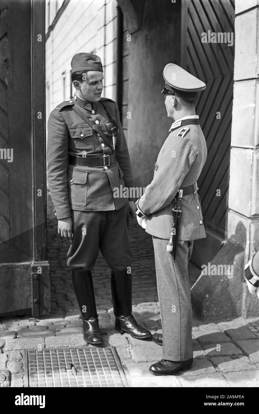 Small talk between Czech and German sergeants, Prague 1930s Stock Photo ...