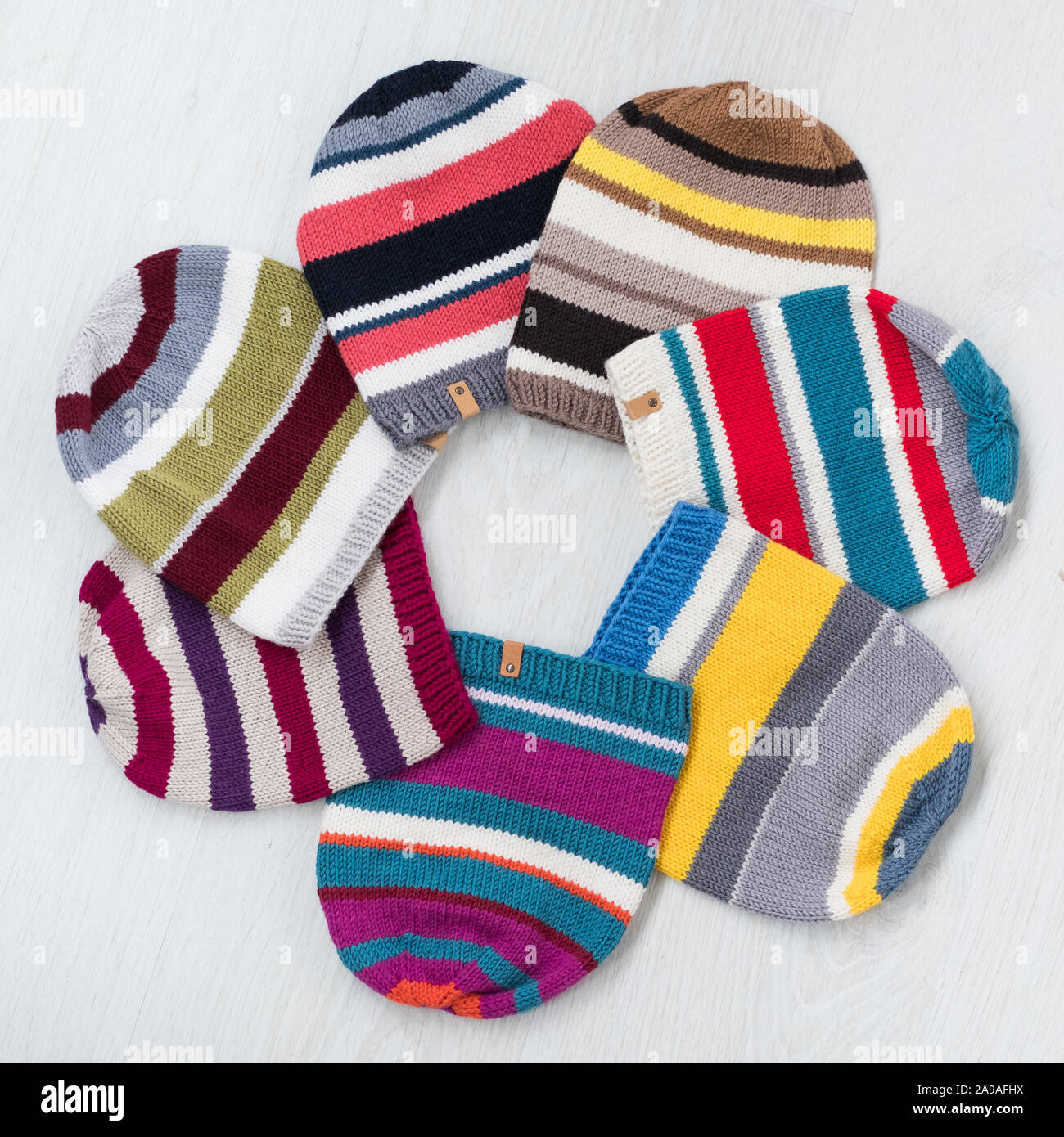 cozy knitted set of hats background Stock Photo - Alamy