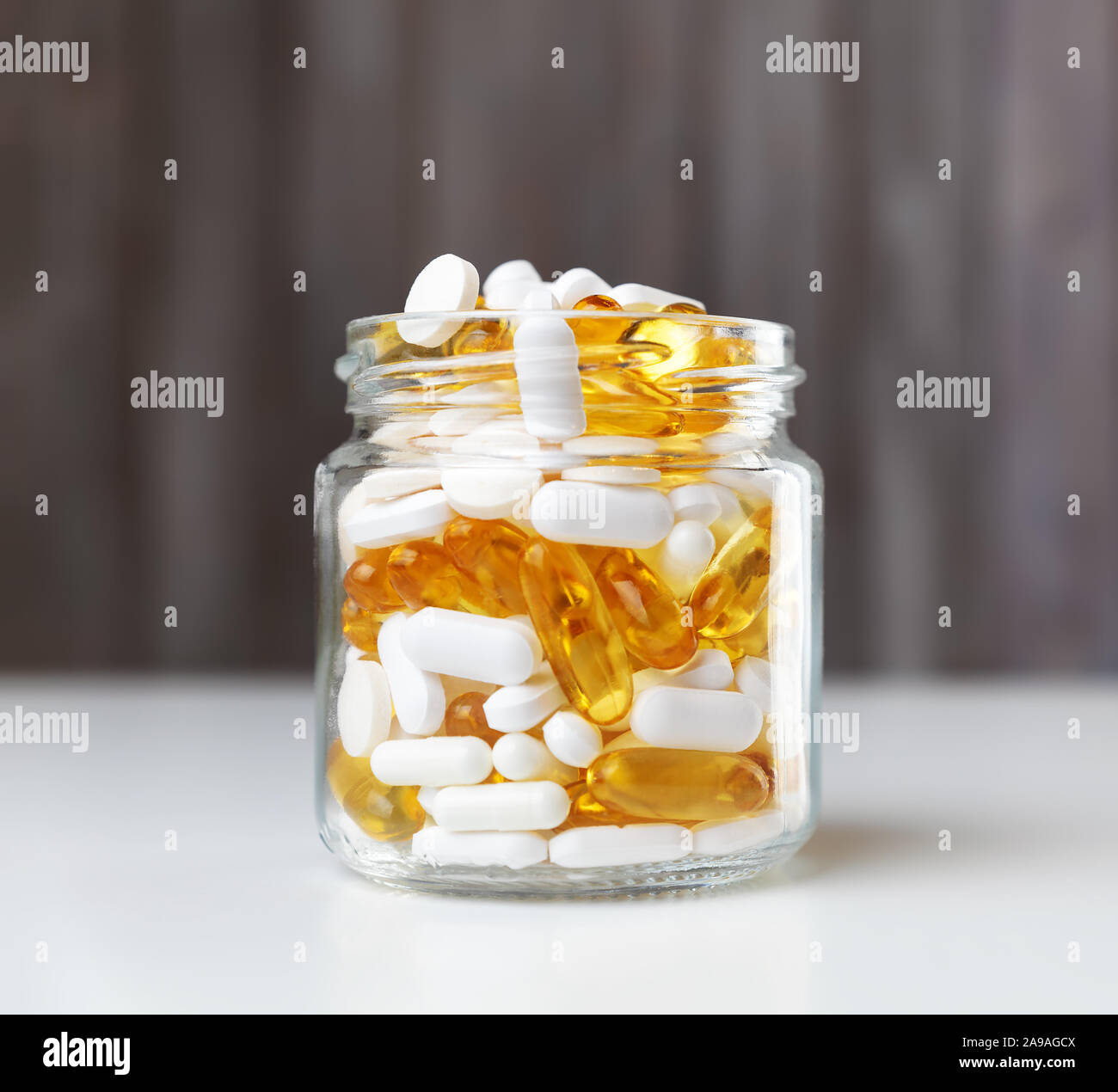 Pills in jar on hi-res stock photography and images - Alamy