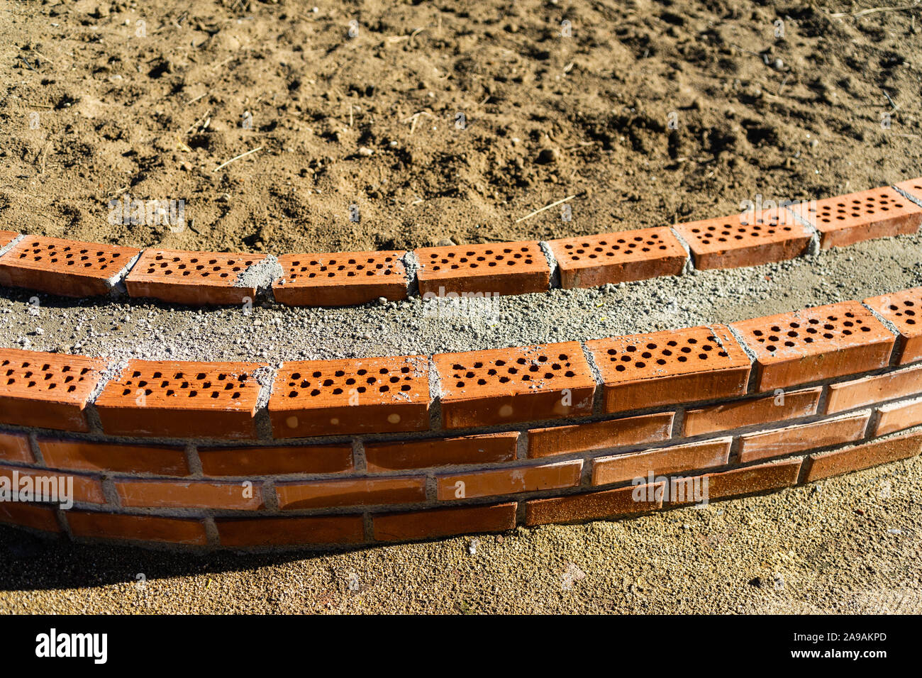 Photo of installed bricks on construction site Stock Photo - Alamy
