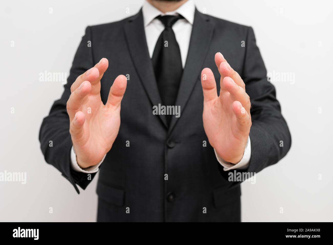 Male human with beard wear formal working suit clothes raising one hand ...