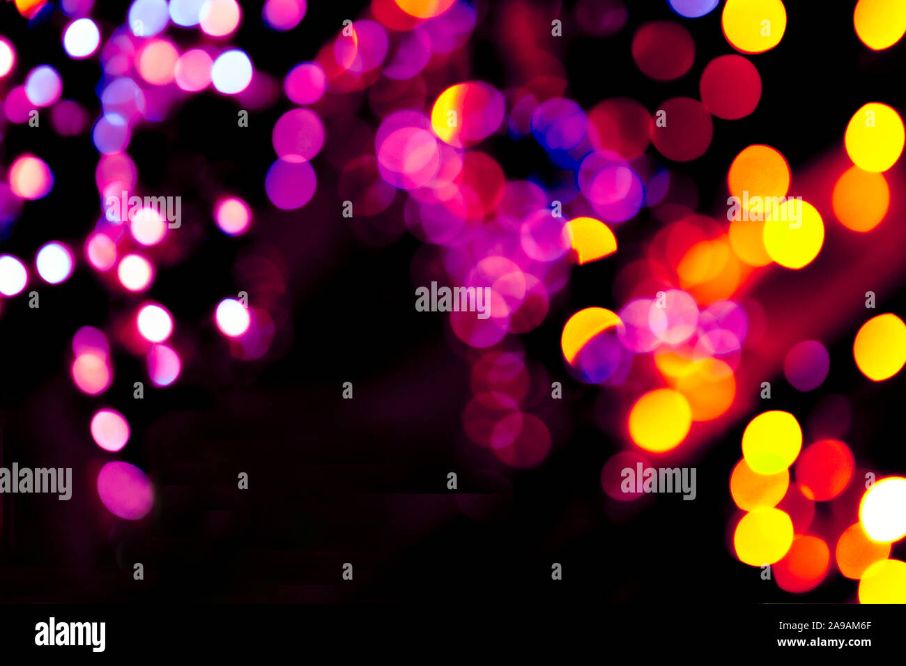Colorful circles bokeh festive glitter dark background. Holiday ...
