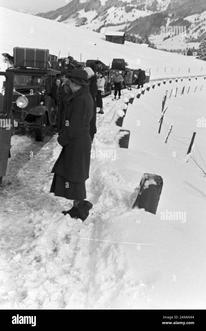 Car traffic in a snowy winter landscape, Germany 1930s Stock Photo - Alamy