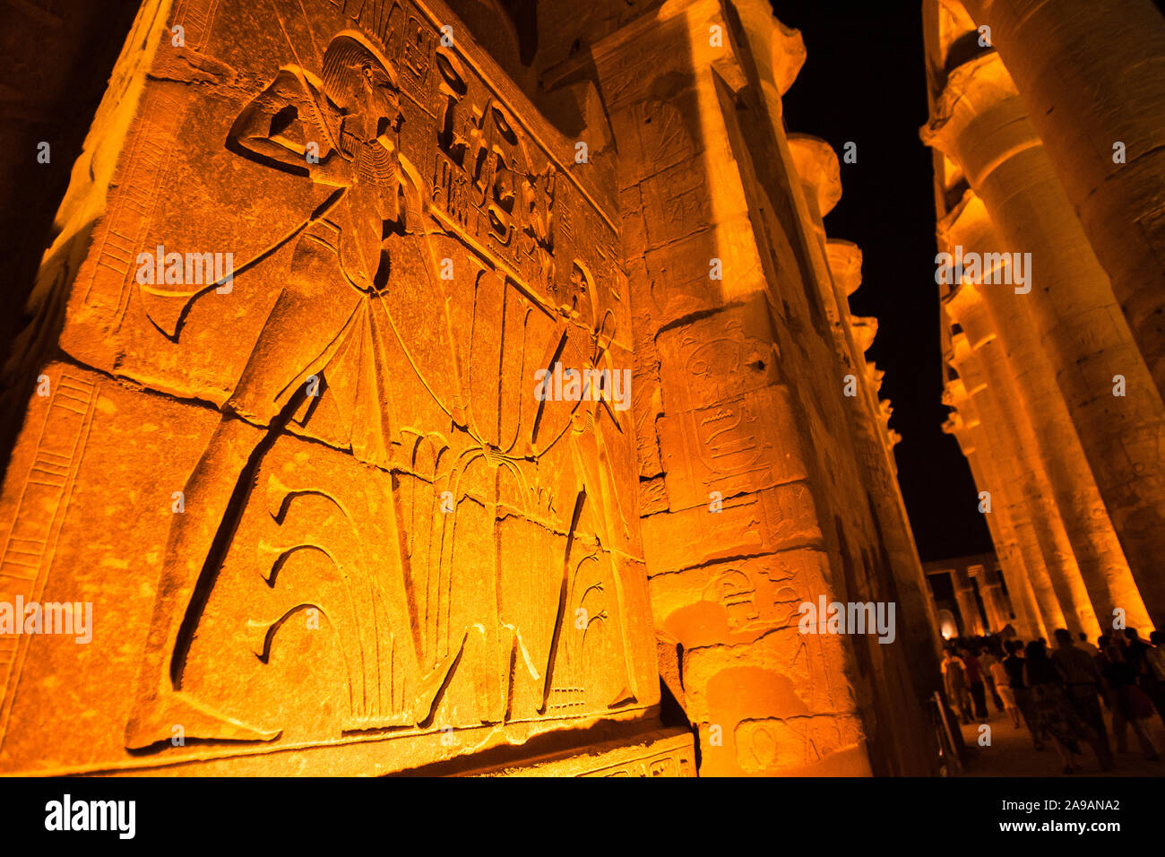 Luxor, Egypt - April 28, 2008: An illuminated relief showing dual ...