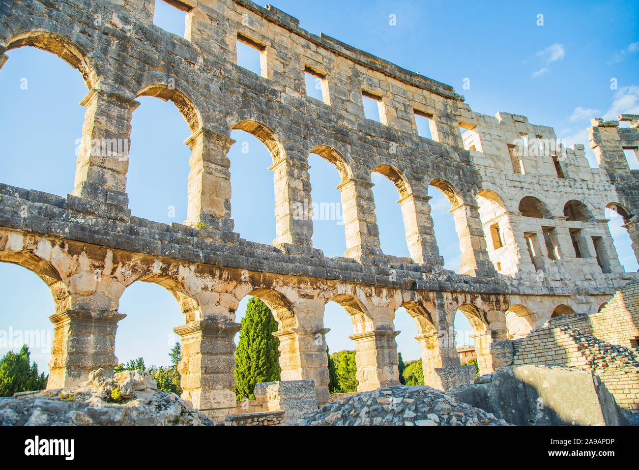 Big stone arches of monumental ancient Roman arena in Pula, Istria ...