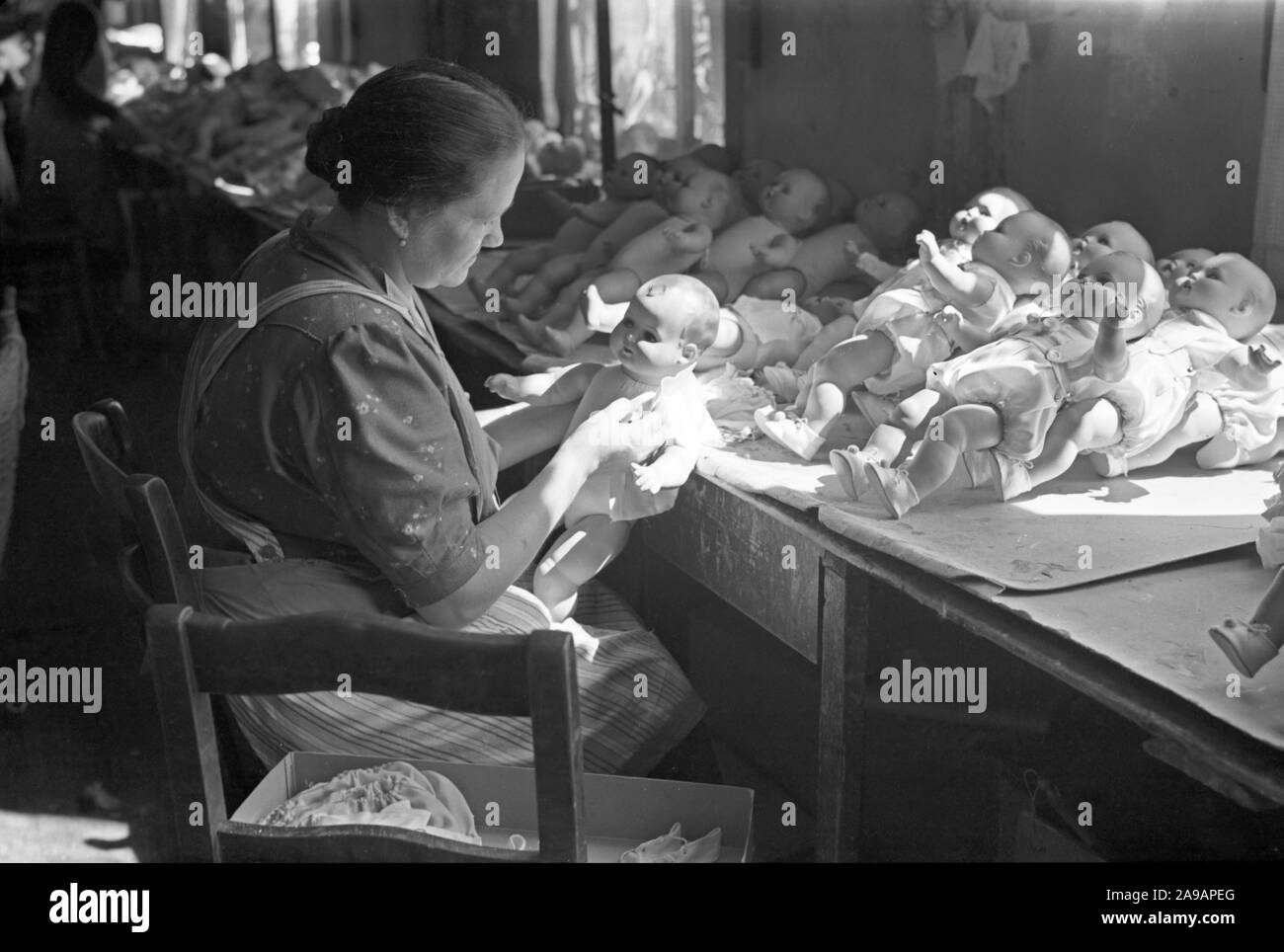 Making doll factory hi-res stock photography and images - Alamy