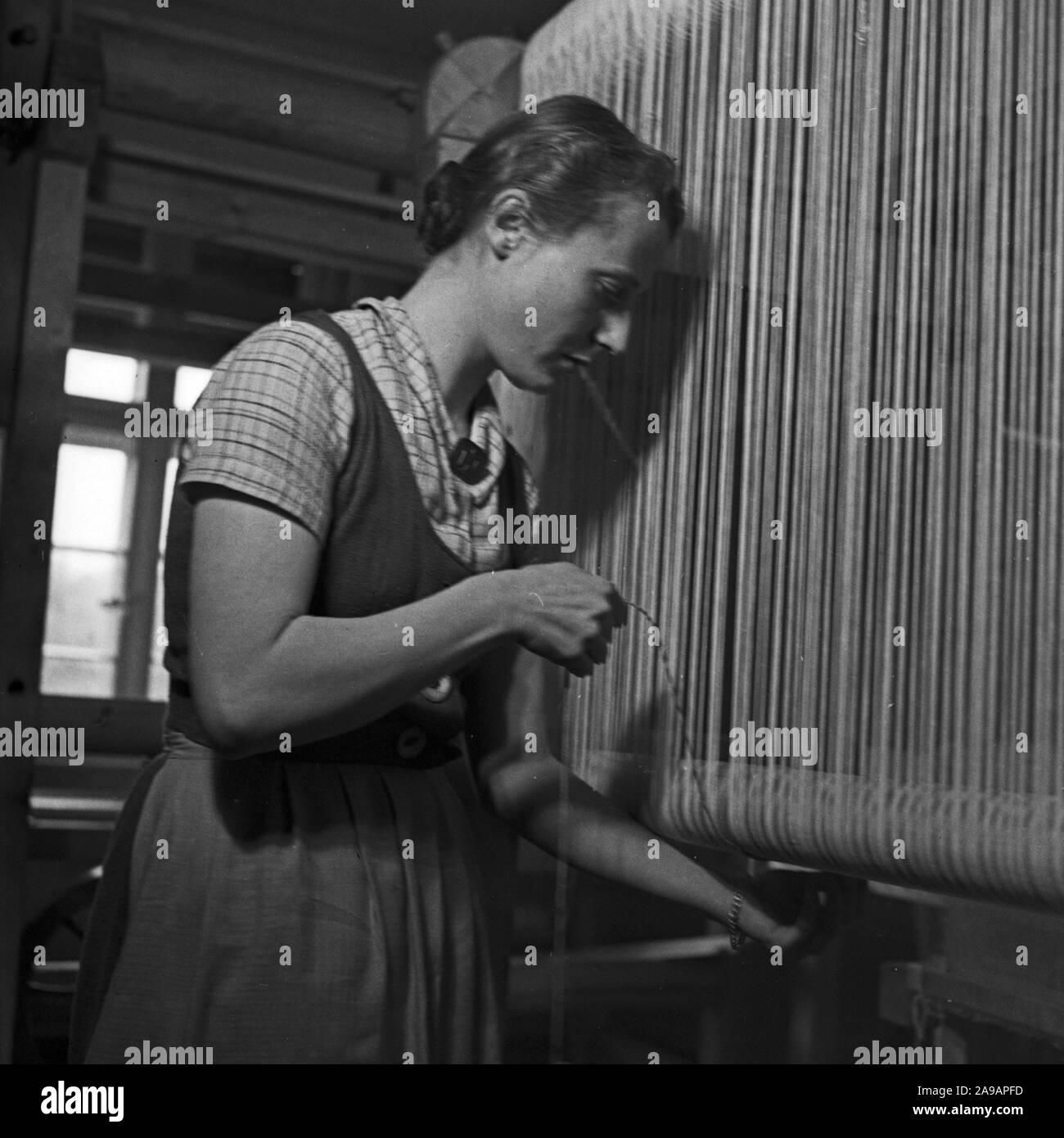 Apprenticeship to a weaver and spinner at the weaving school at ...