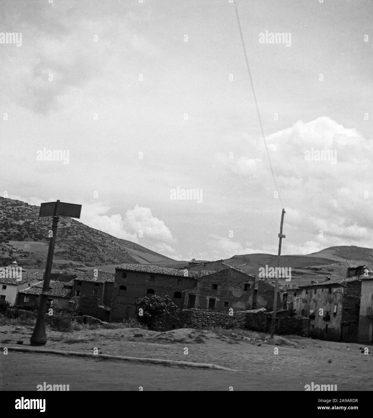 Leaving old houses behind, Spain 1930s Stock Photo - Alamy