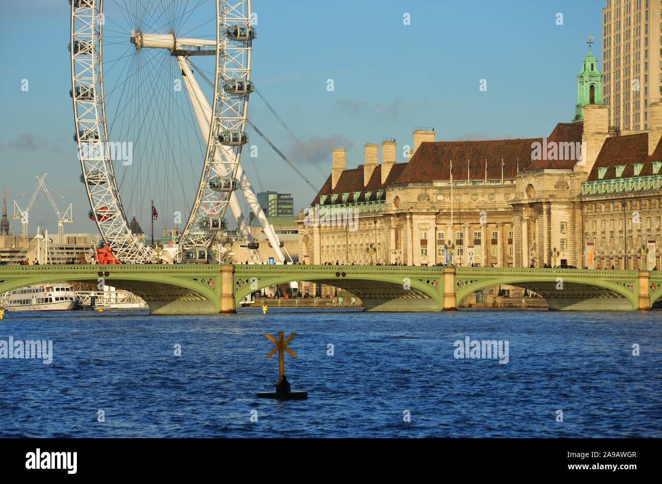 The Westminster Bridge with ferris wheel Stock Photo - Alamy