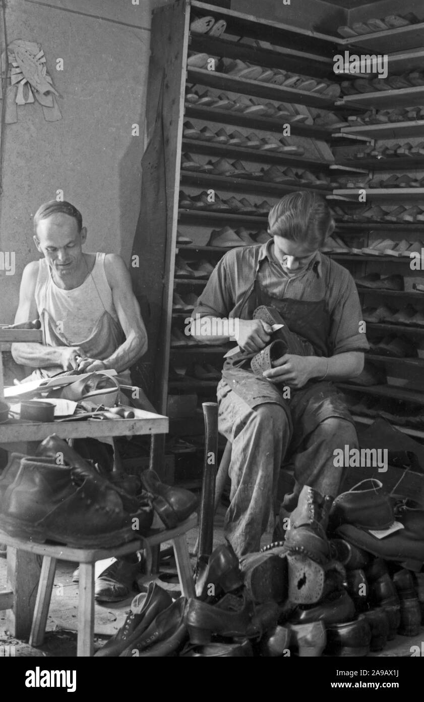 Shoemaker at work, Germany 1940s Stock Photo - Alamy