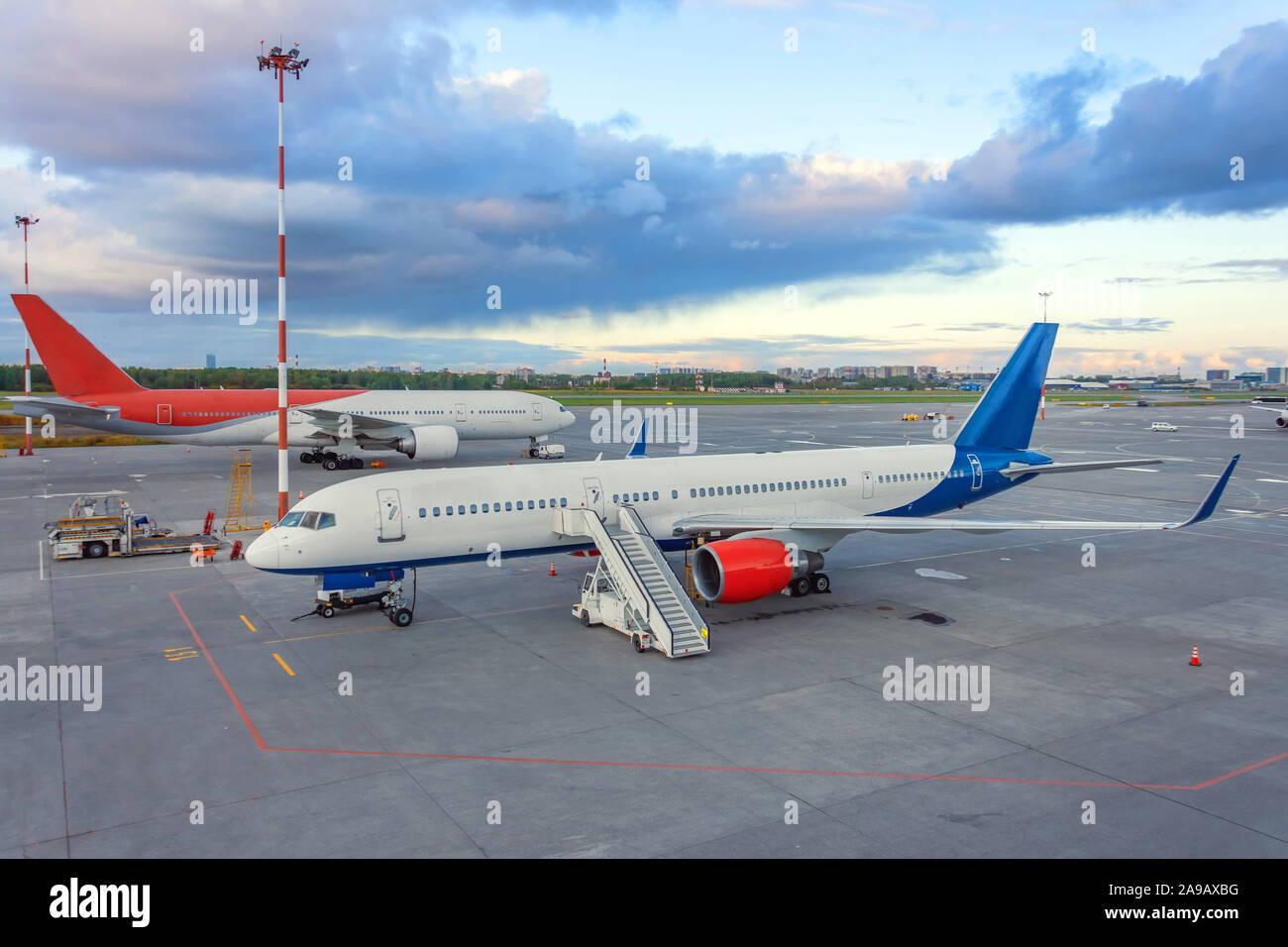Parking at the airport, two passenger aircraft awaiting flight Stock ...