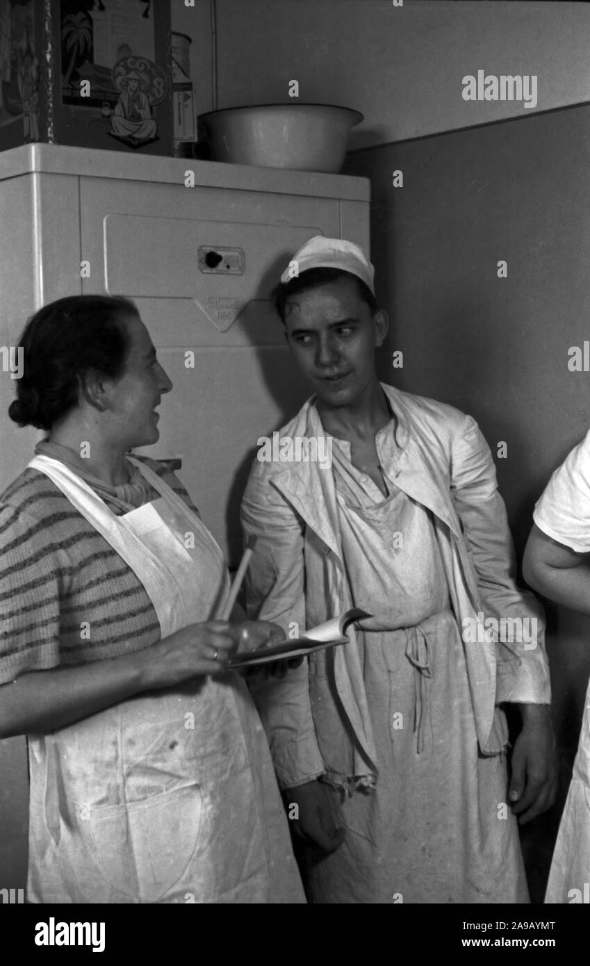 Daily business at an apprentice home of the NSV organization at Berlin ...