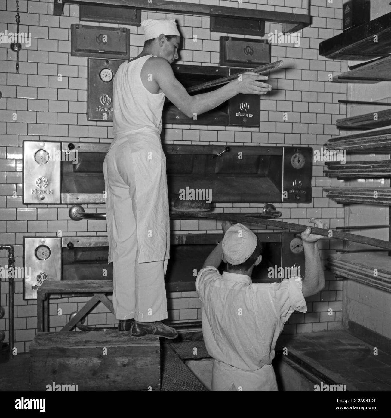 A bakerman and his daily business, Germany 1950s Stock Photo - Alamy