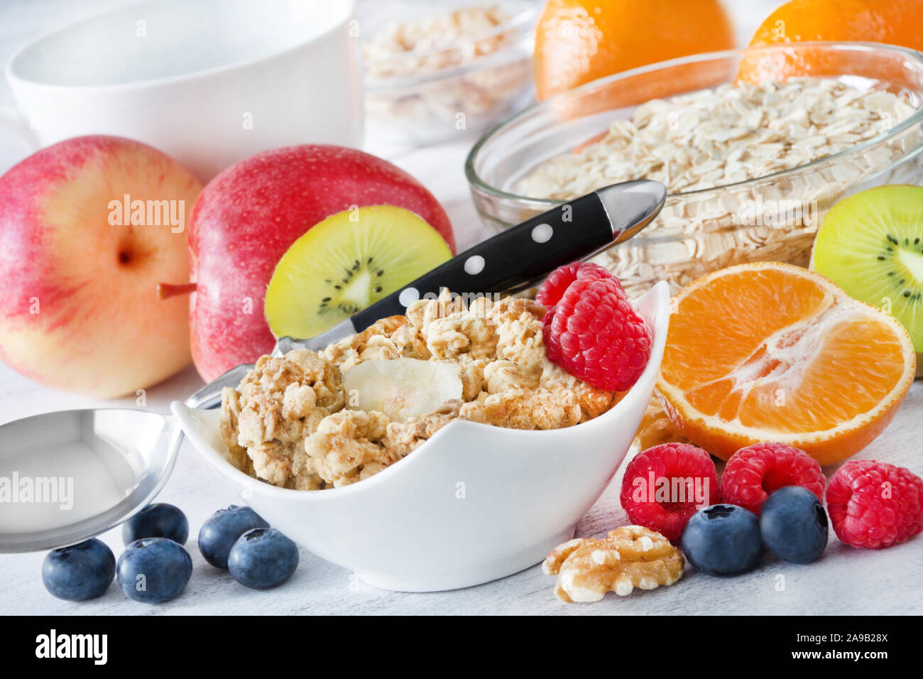 Healthy breakfast with fruits and nuts Stock Photo - Alamy