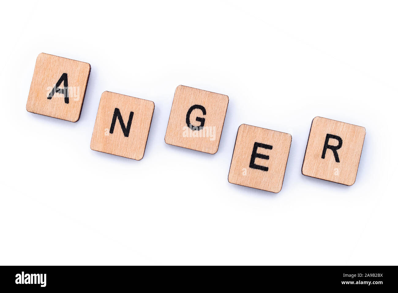 The word ANGER, spelt with wooden letter tiles Stock Photo - Alamy
