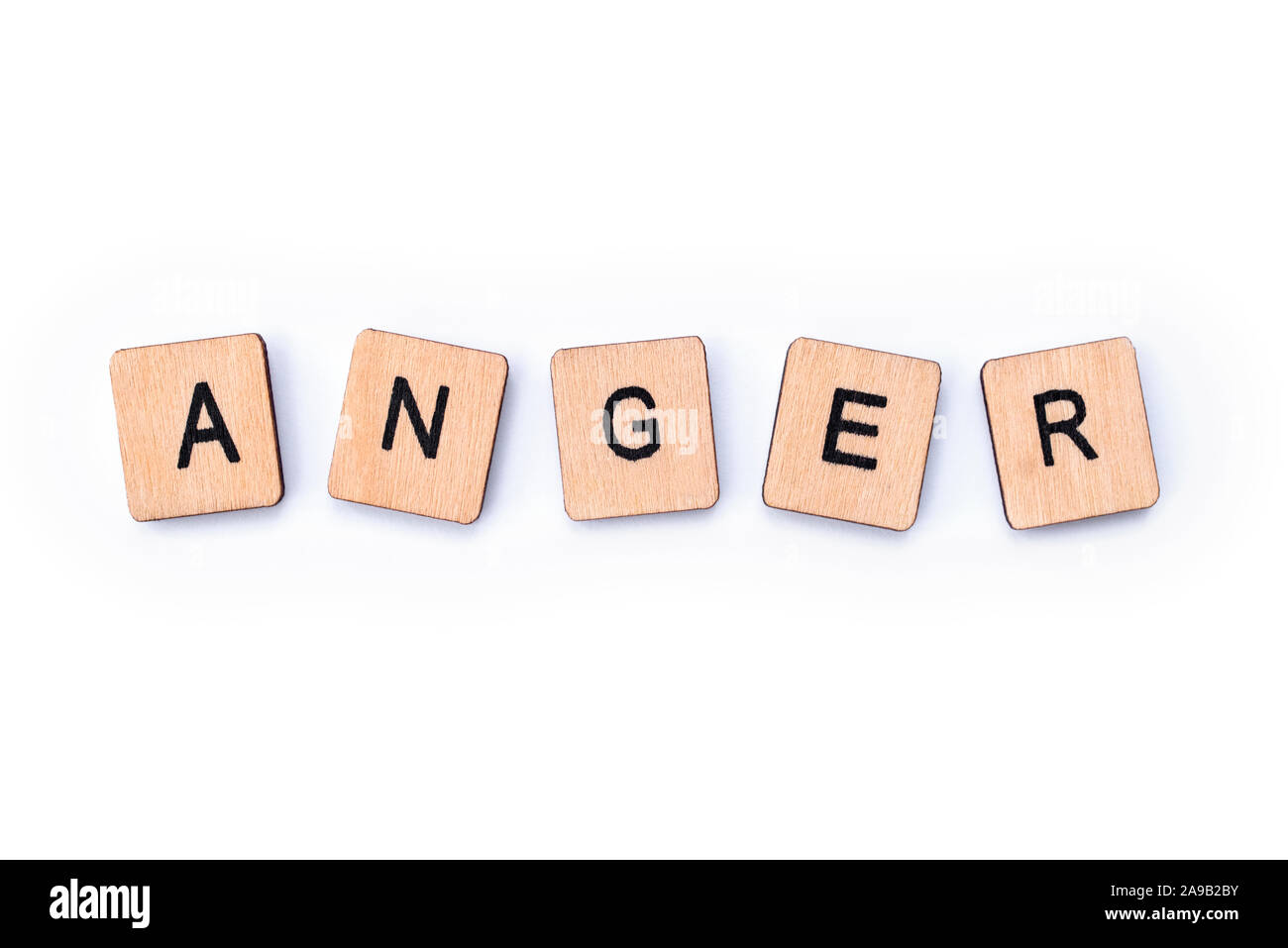 The word ANGER, spelt with wooden letter tiles Stock Photo - Alamy