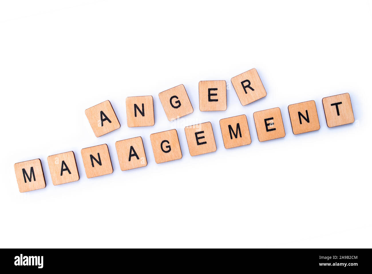 The phrase ANGER MANAGEMENT, spelt with wooden letter tiles Stock Photo ...
